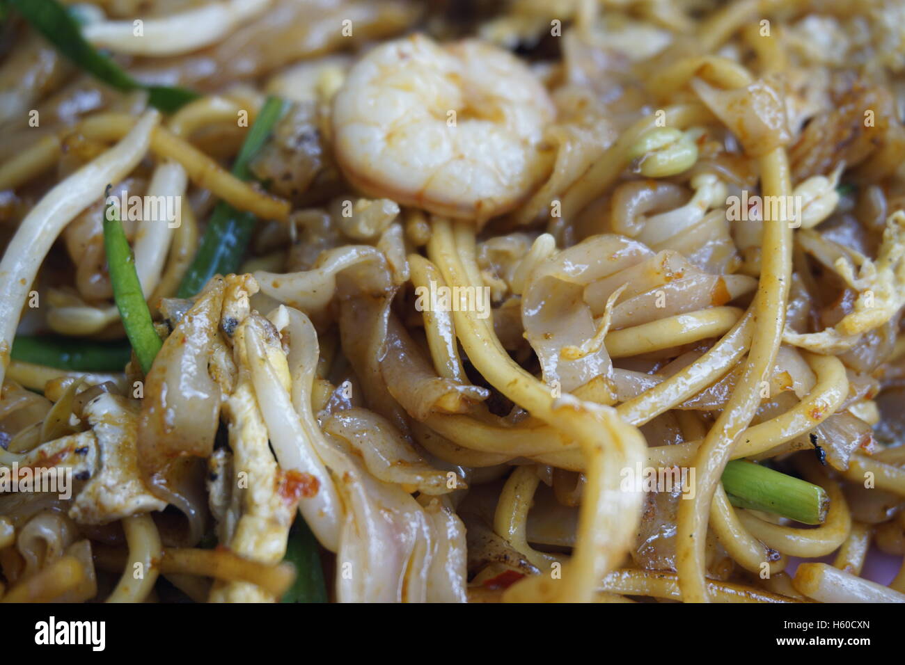 closeup of fried kway teow mee noodle, Malaysian hawker food Stock ...