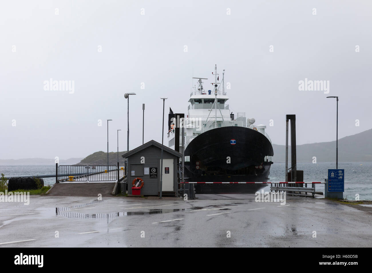 Front loading ship, hinged bow in the rain. Fiskebol - Melbu ferry ...
