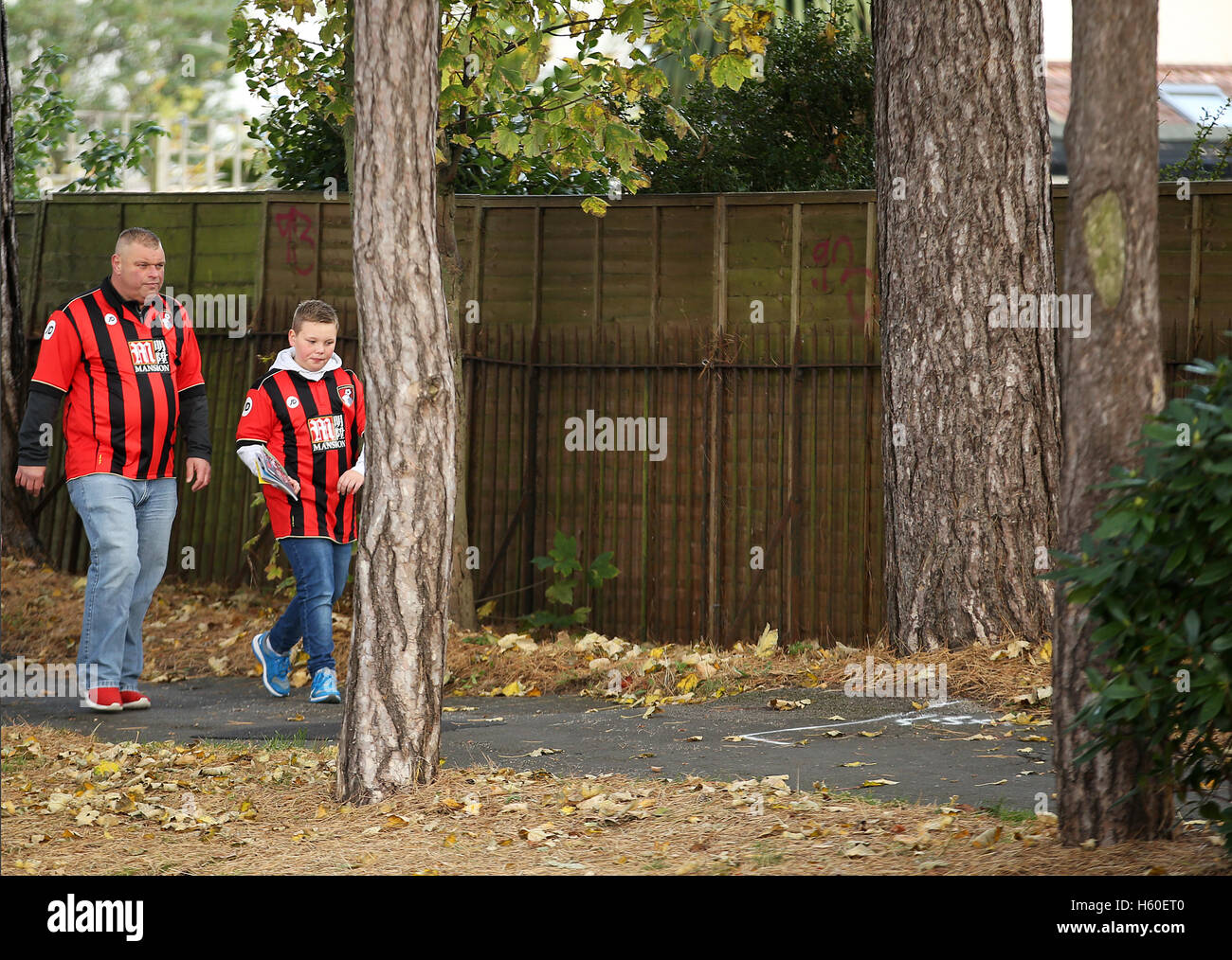 Two Bournemouth fans make their way to the ground before the Premier ...
