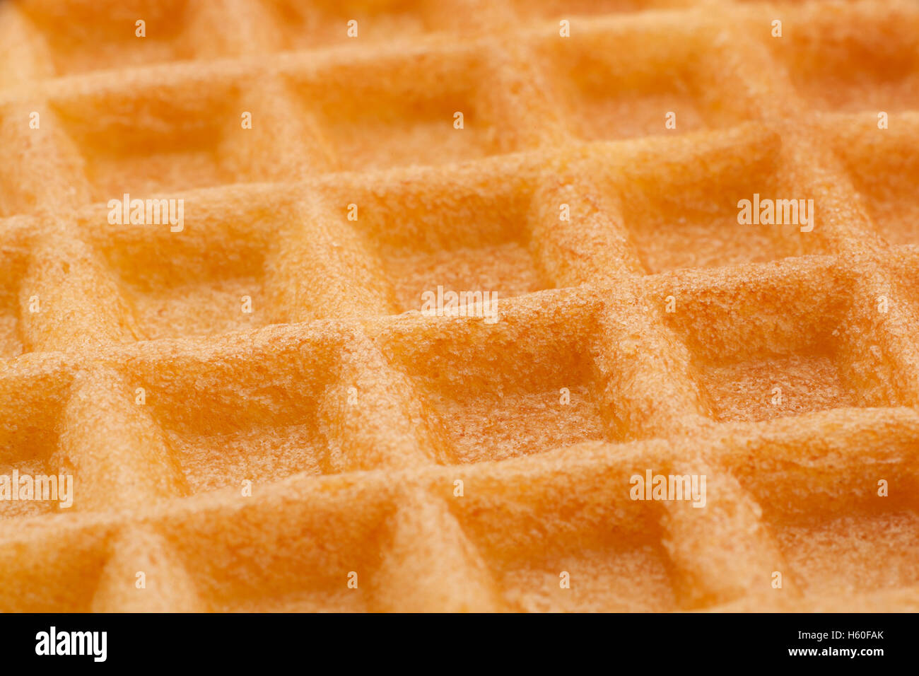 Sweet yellow wafers closeup detail background Stock Photo - Alamy