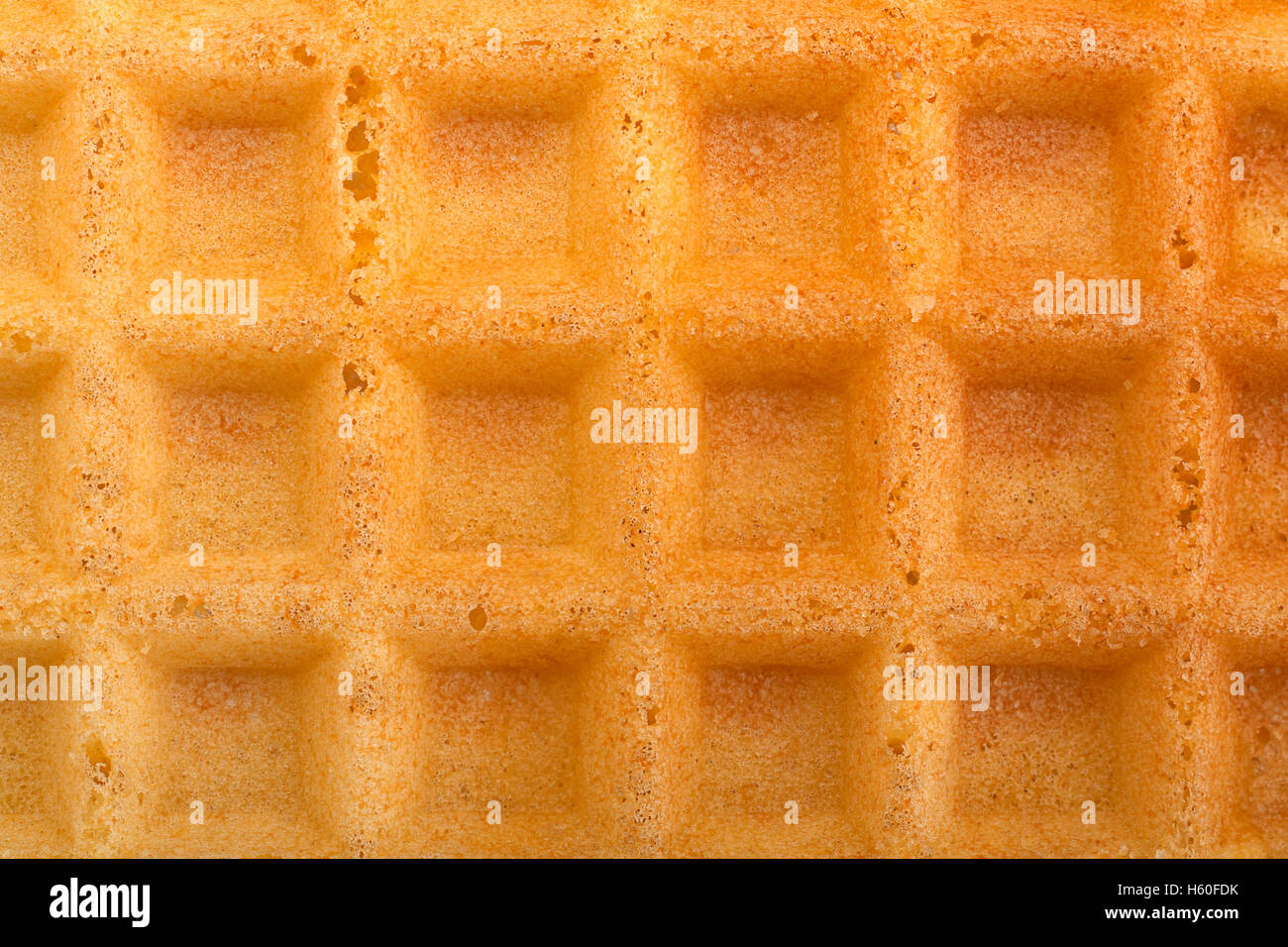 Sweet yellow wafers closeup detail background Stock Photo - Alamy