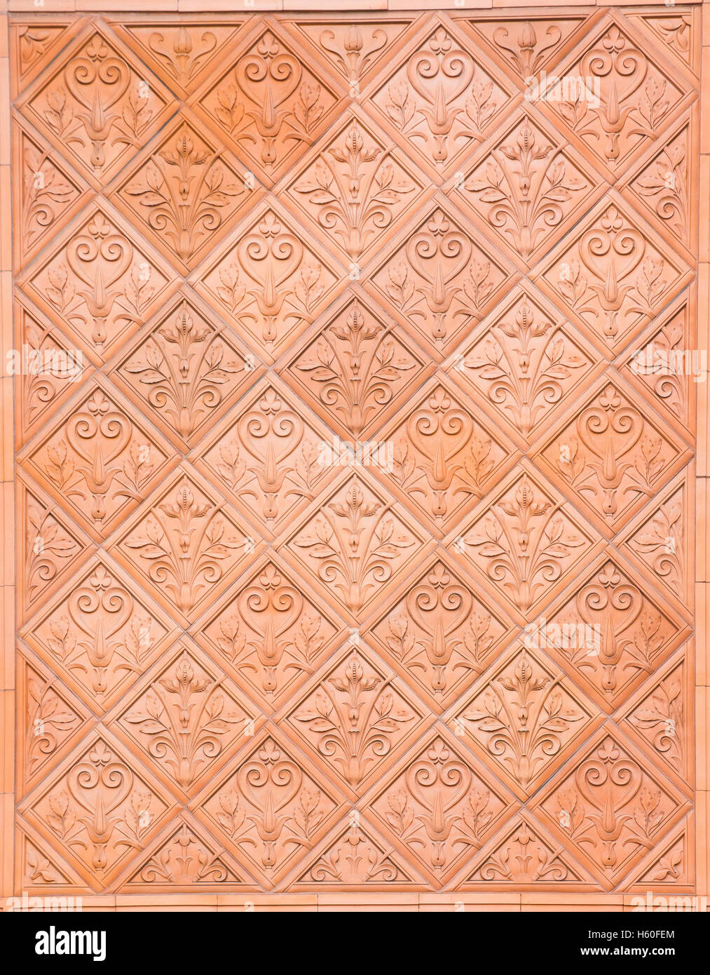 Closeup of terracotta stone with a repeating pattern Stock Photo - Alamy