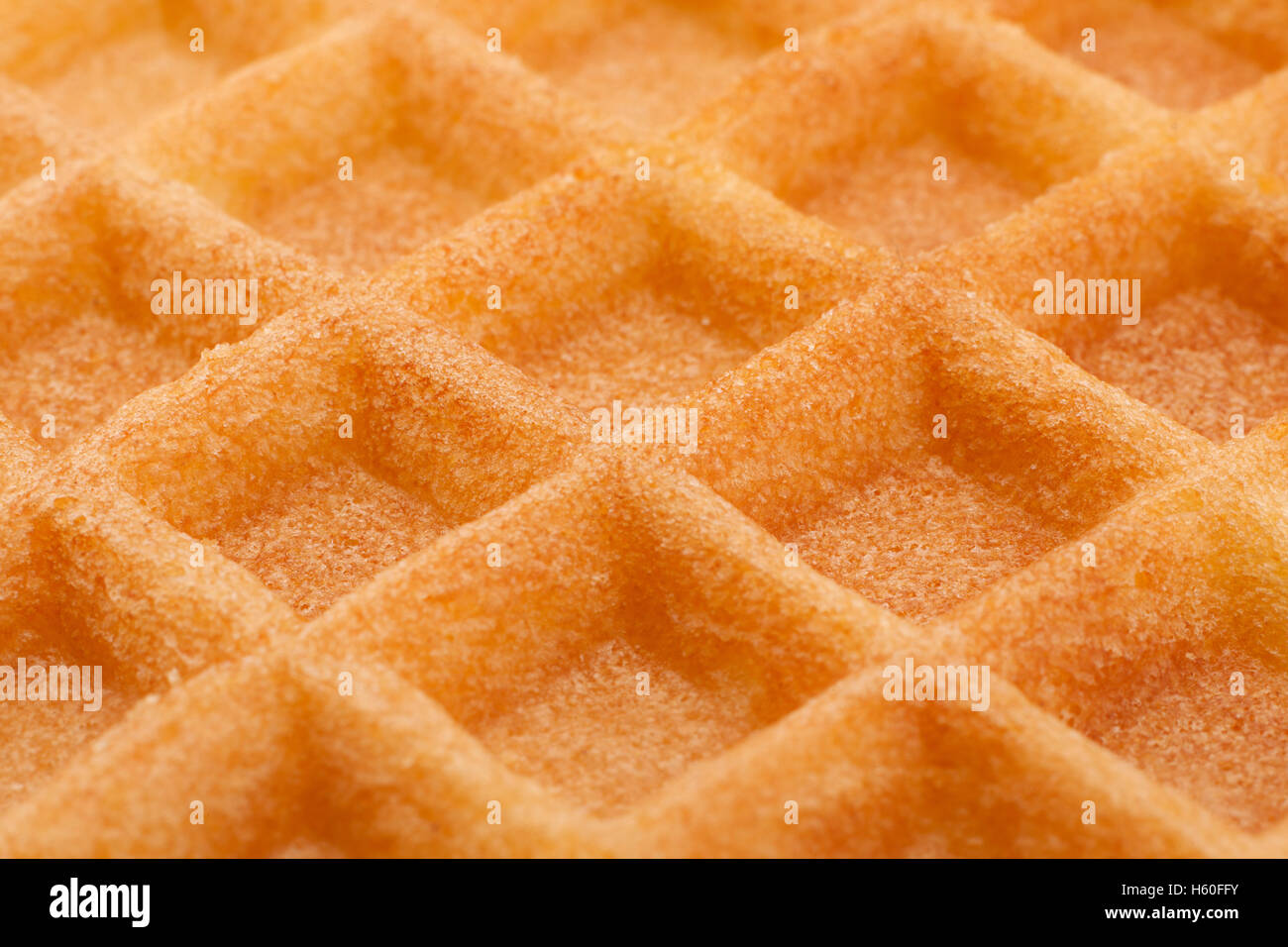 Sweet yellow wafers closeup detail background Stock Photo - Alamy