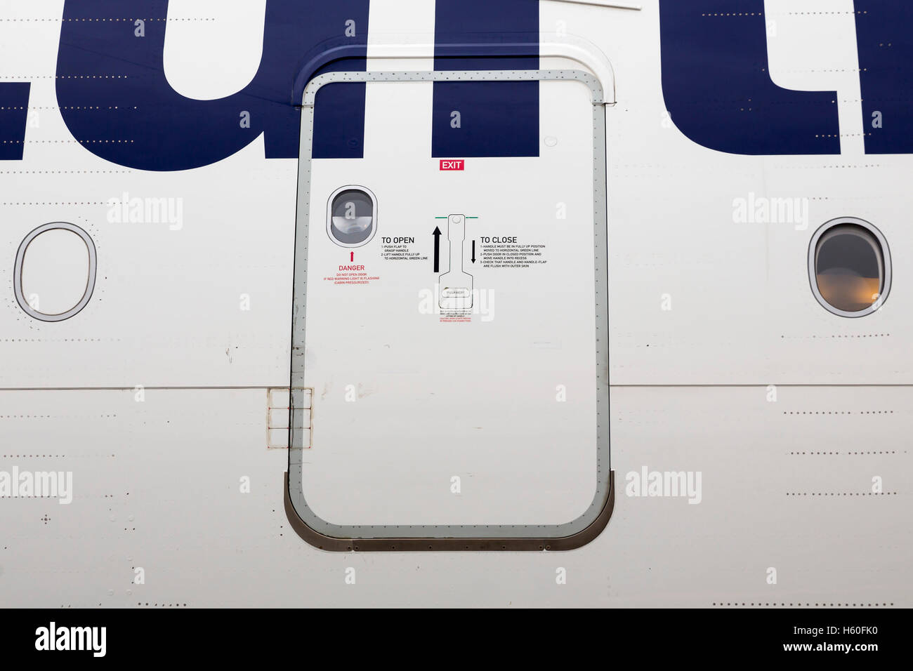Airbus A380 airplane's door on a runway at an airport Stock Photo - Alamy