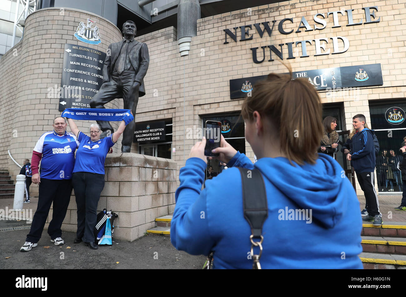 Ipswich fans pose for pictures with the Sir Bobby Robson statue during ...
