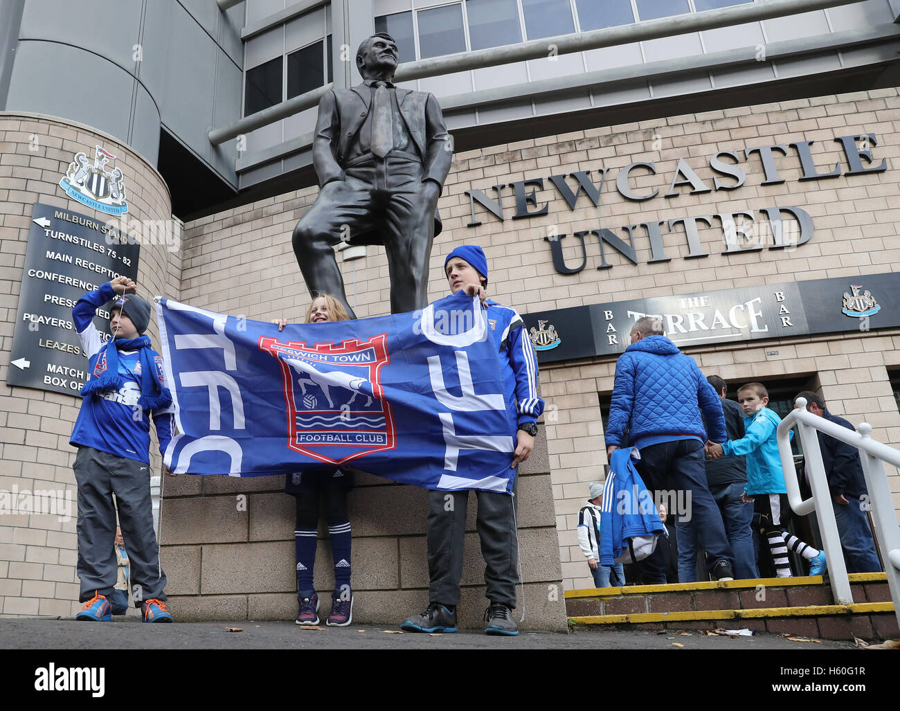 Ipswich fans pose for pictures with the Sir Bobby Robson statue during ...