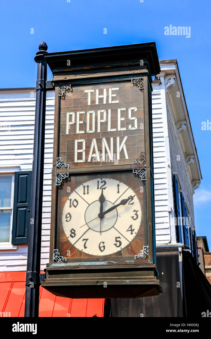 Old 1920s Peoples Bank overhead sign and clock in Beaufort, SC Stock ...