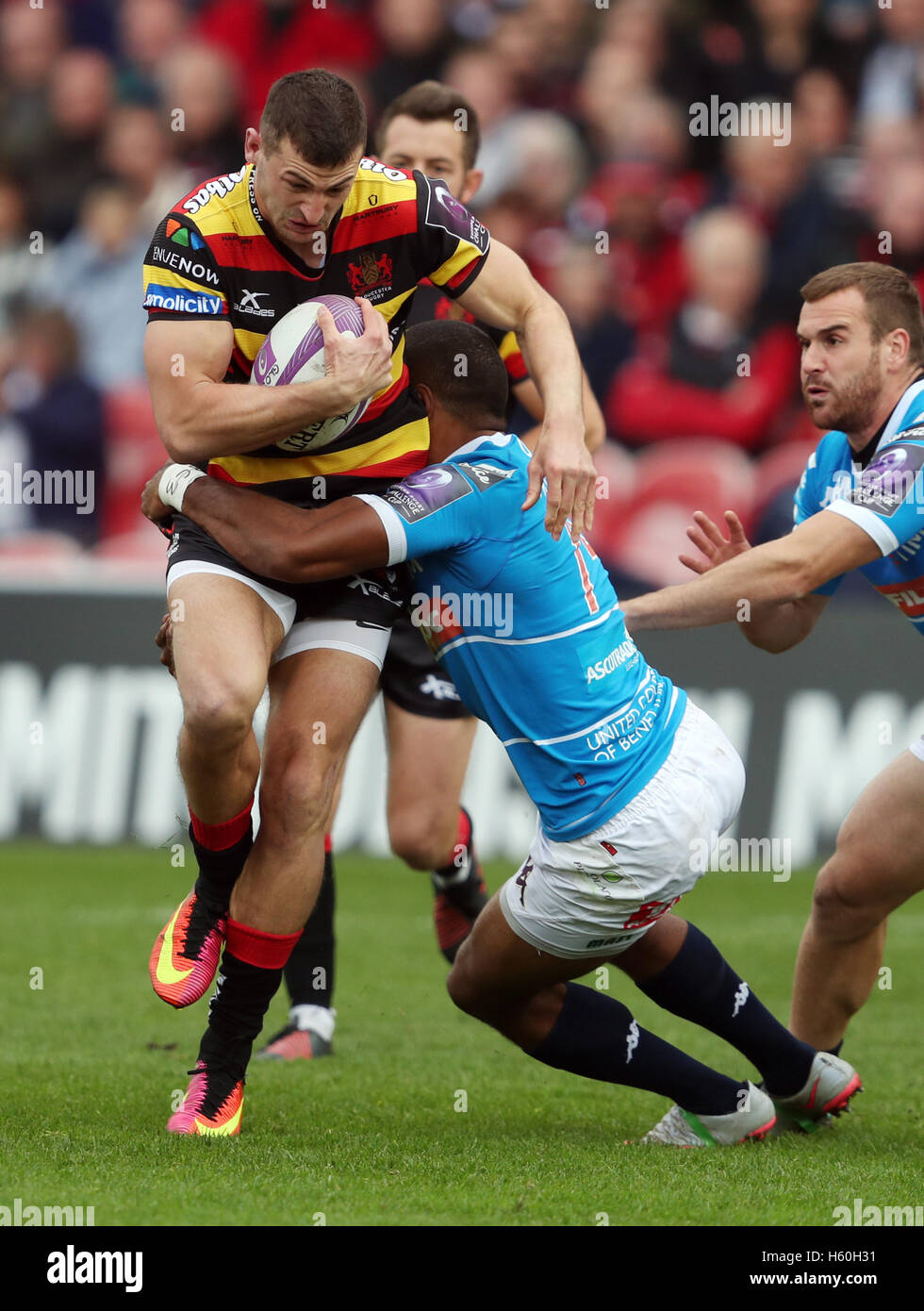 Gloucester's Jonny May is tackled by Treviso's Michael Tagicakibau ...