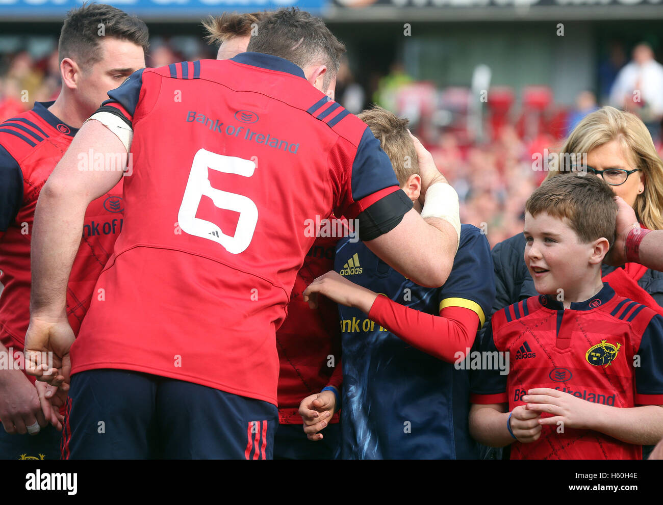 Anthony Foley's sons Tony and Dan comforted by captain Peter O'Mahony ...
