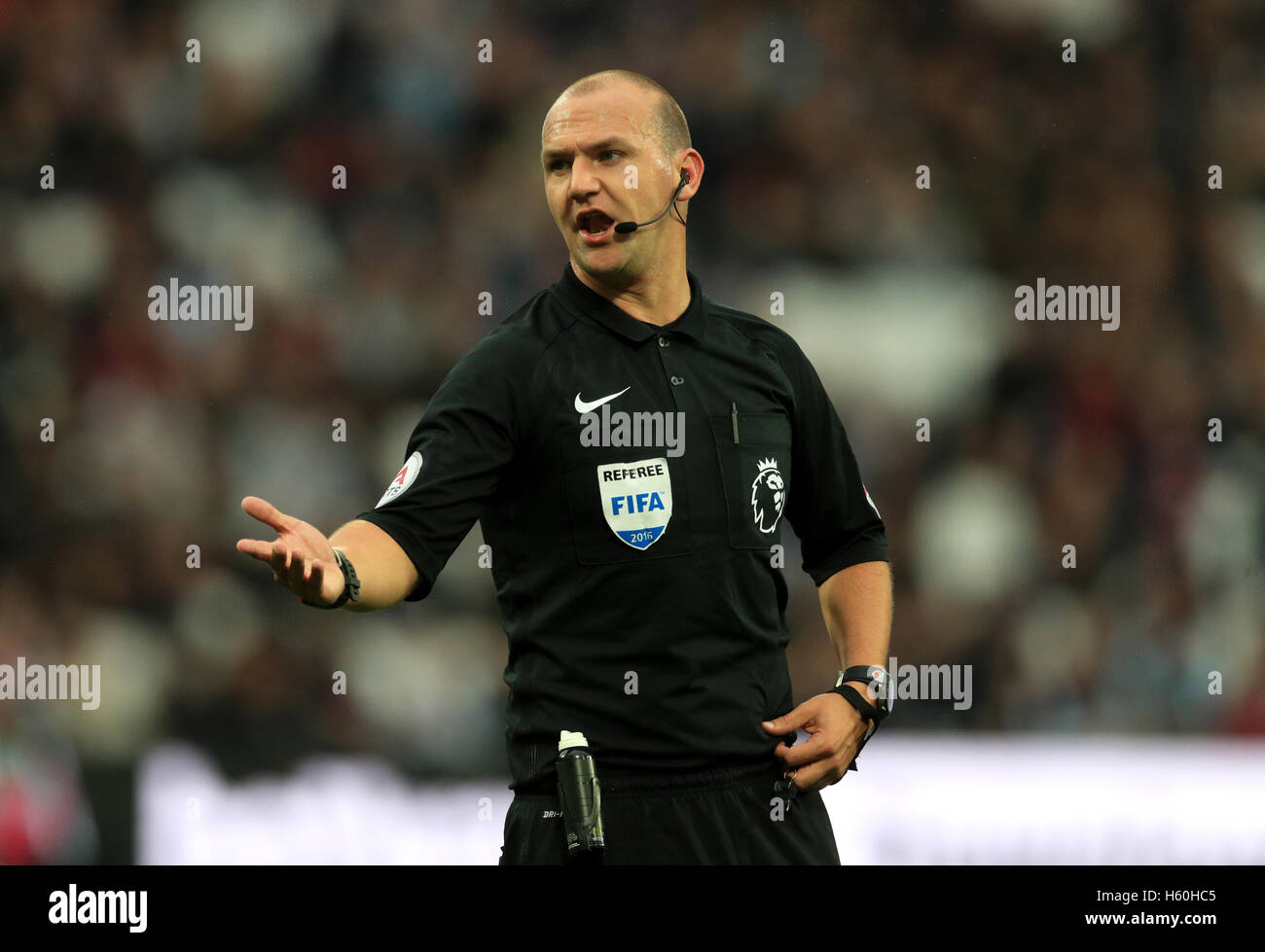 Referee Robert Madley gestures during the Premier League match at the ...
