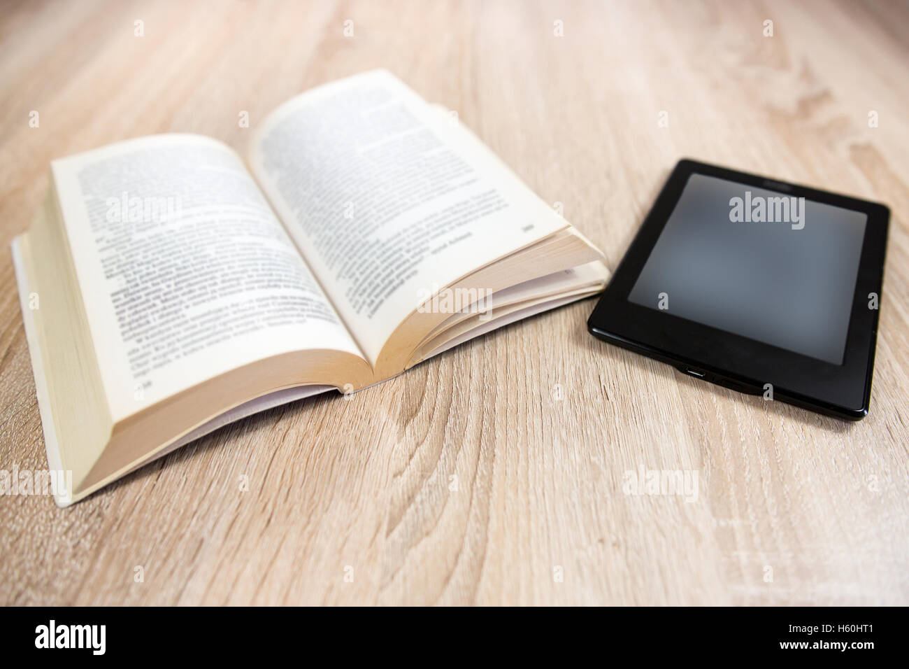 Old book and modern one Stock Photo - Alamy