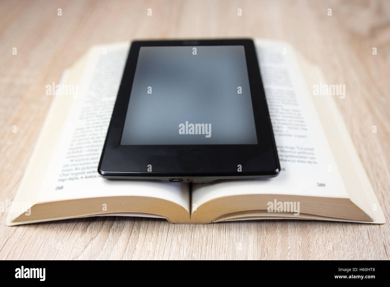 Old book and modern one Stock Photo - Alamy