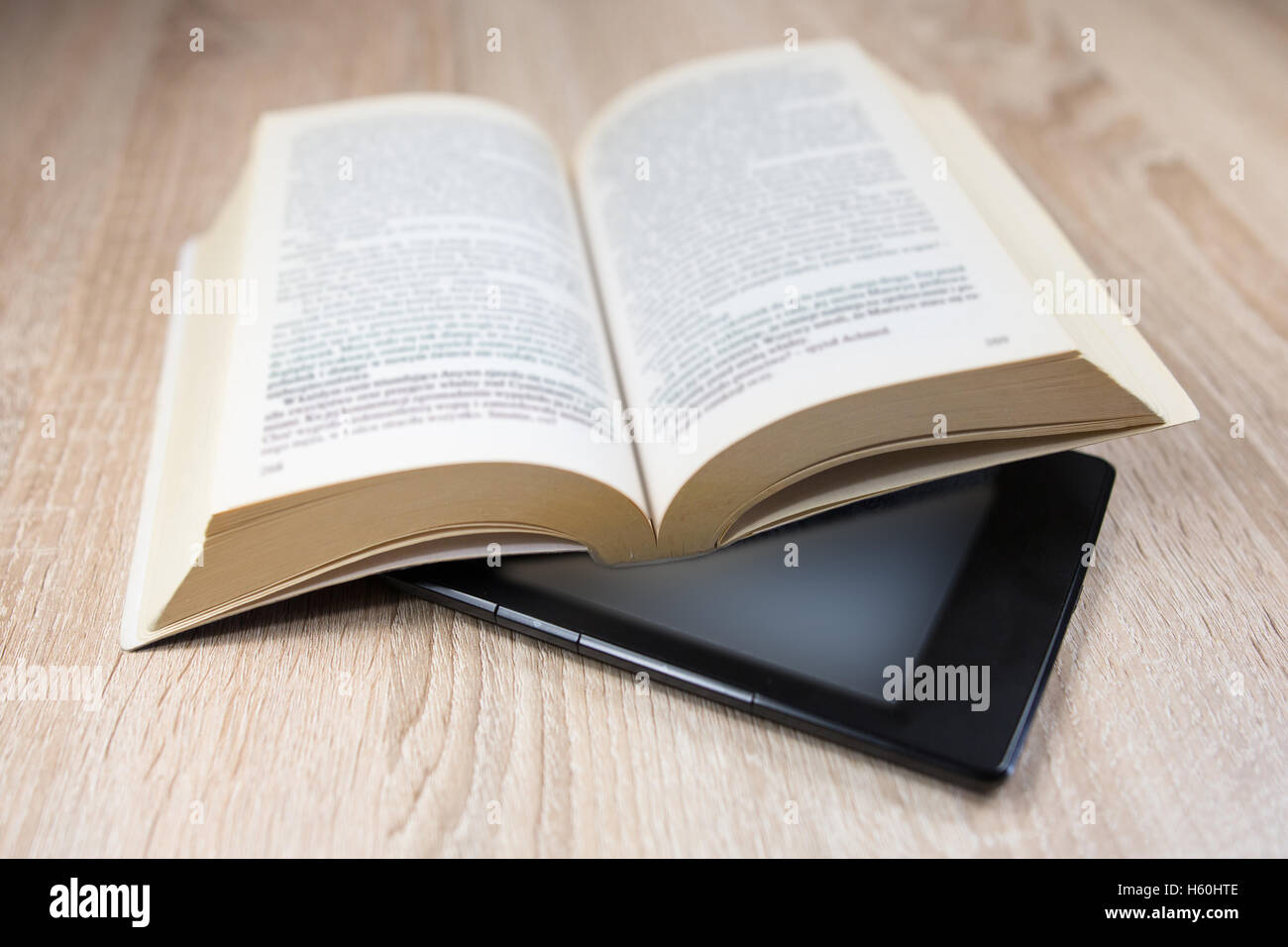 Old book and modern one Stock Photo - Alamy