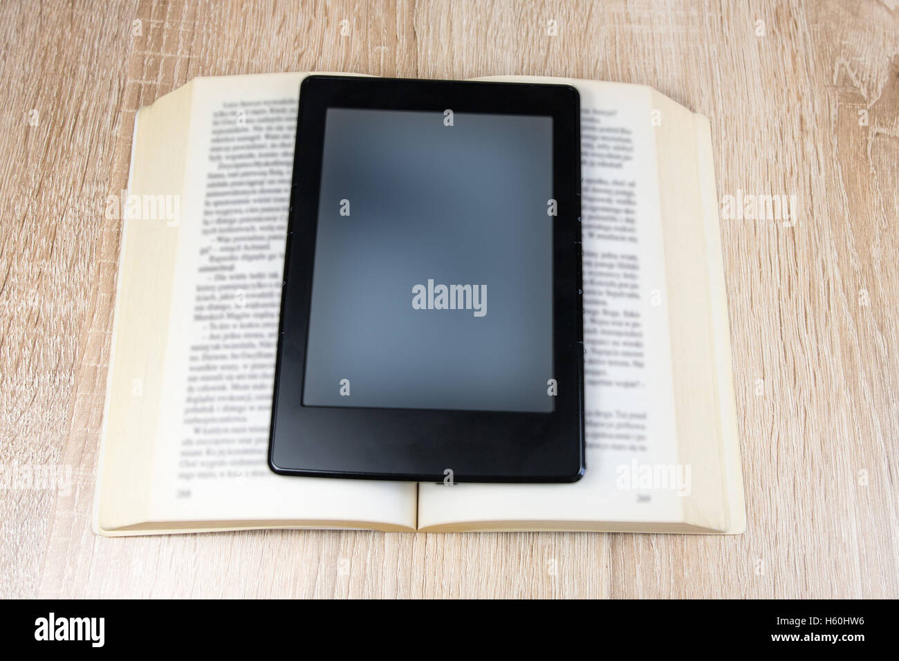 Old book and modern one Stock Photo - Alamy