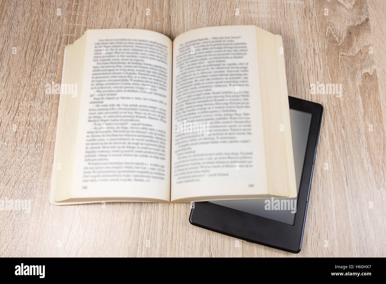 Old book and modern one Stock Photo - Alamy