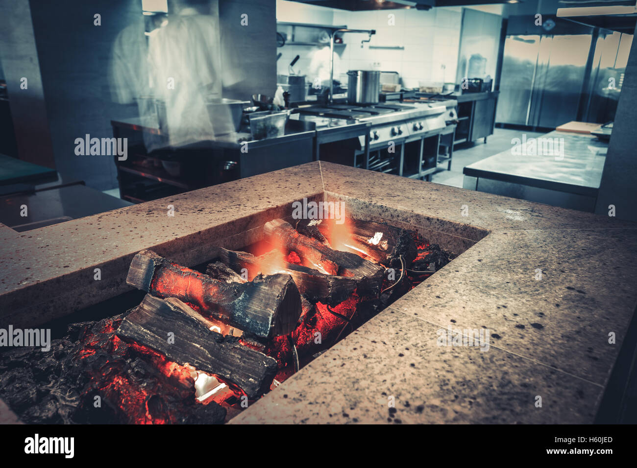 fireplace close-up in restaurant kitchen Stock Photo - Alamy