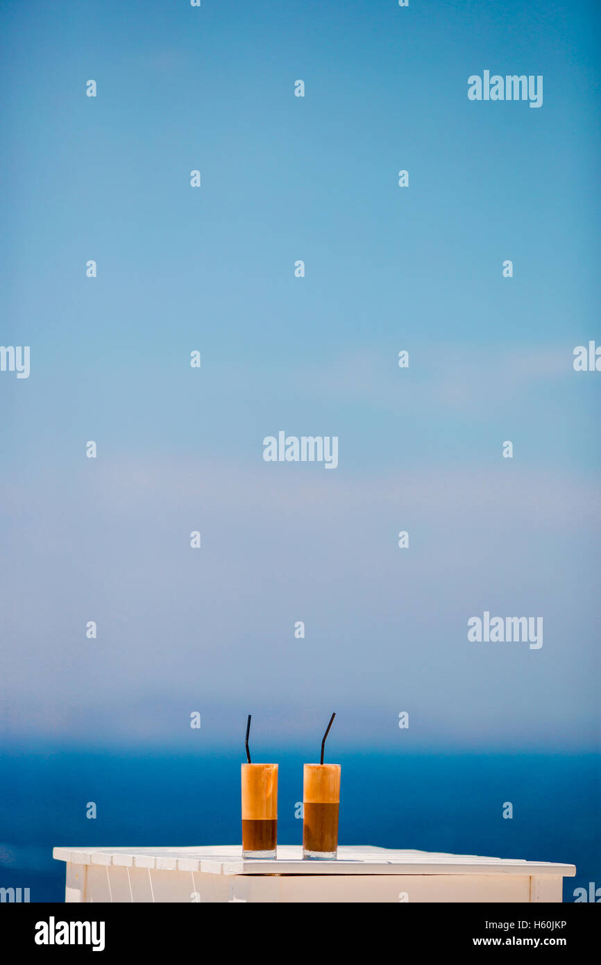 Traditional frappe, ice coffee on the beach cafe. Summer iced coffee ...