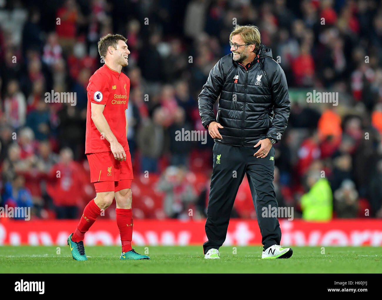 Liverpool's James Milner (left) and Liverpool manager Jurgen Klopp ...