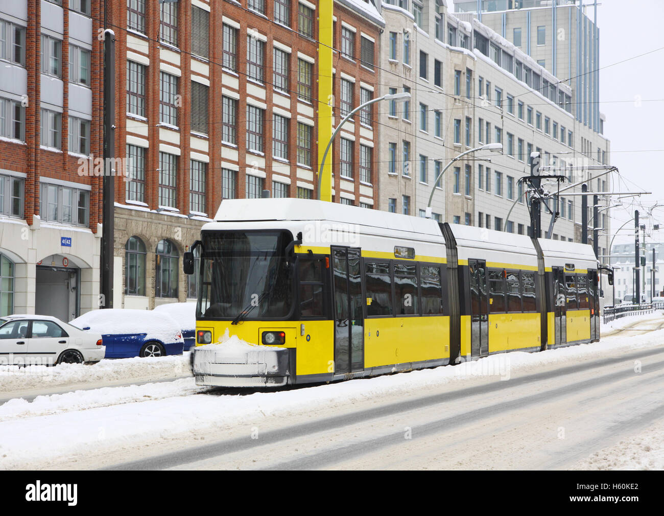 Yellow tram on the snowy street of Berlin, Germany Stock Photo - Alamy