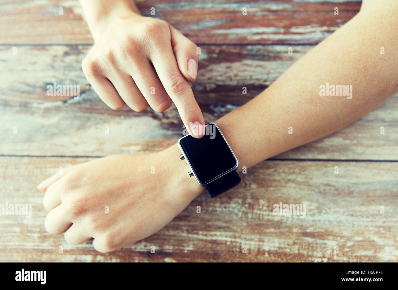 close up of hands setting smart watch Stock Photo - Alamy
