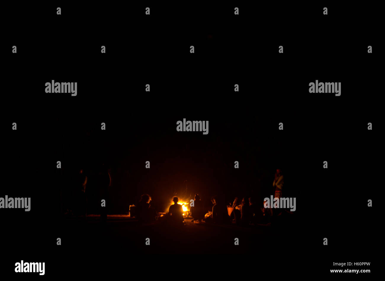Relaxing infront of the fire Stock Photo - Alamy