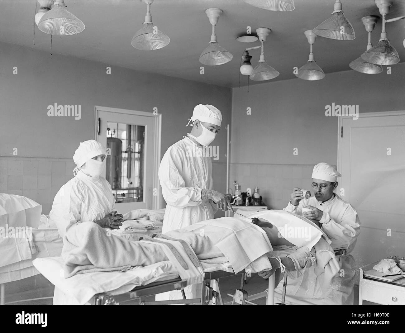 Surgeon Operating on Patient, National Photo Company, 1922 Stock Photo ...