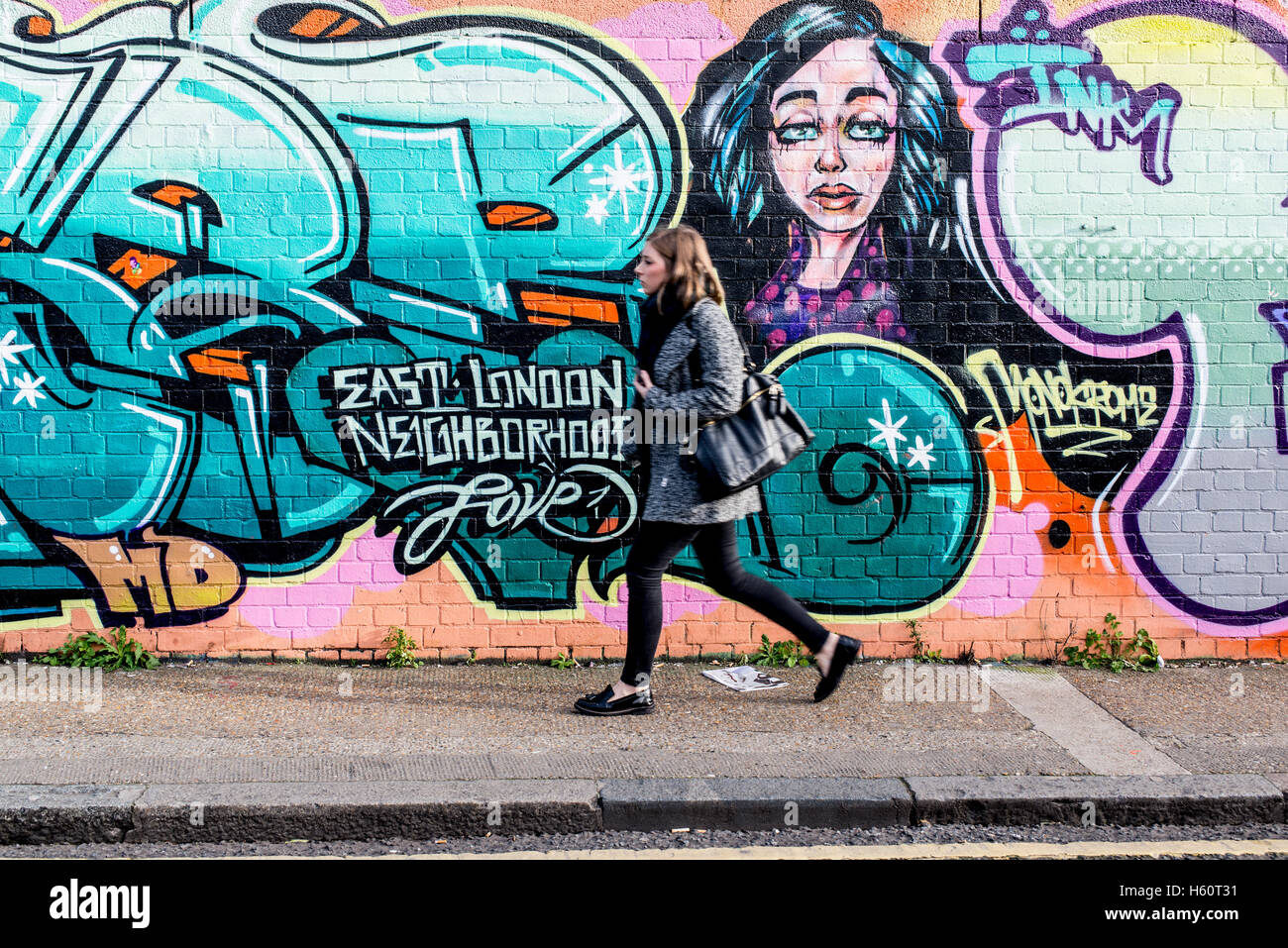 Graffiti wall girl walking hi-res stock photography and images - Alamy