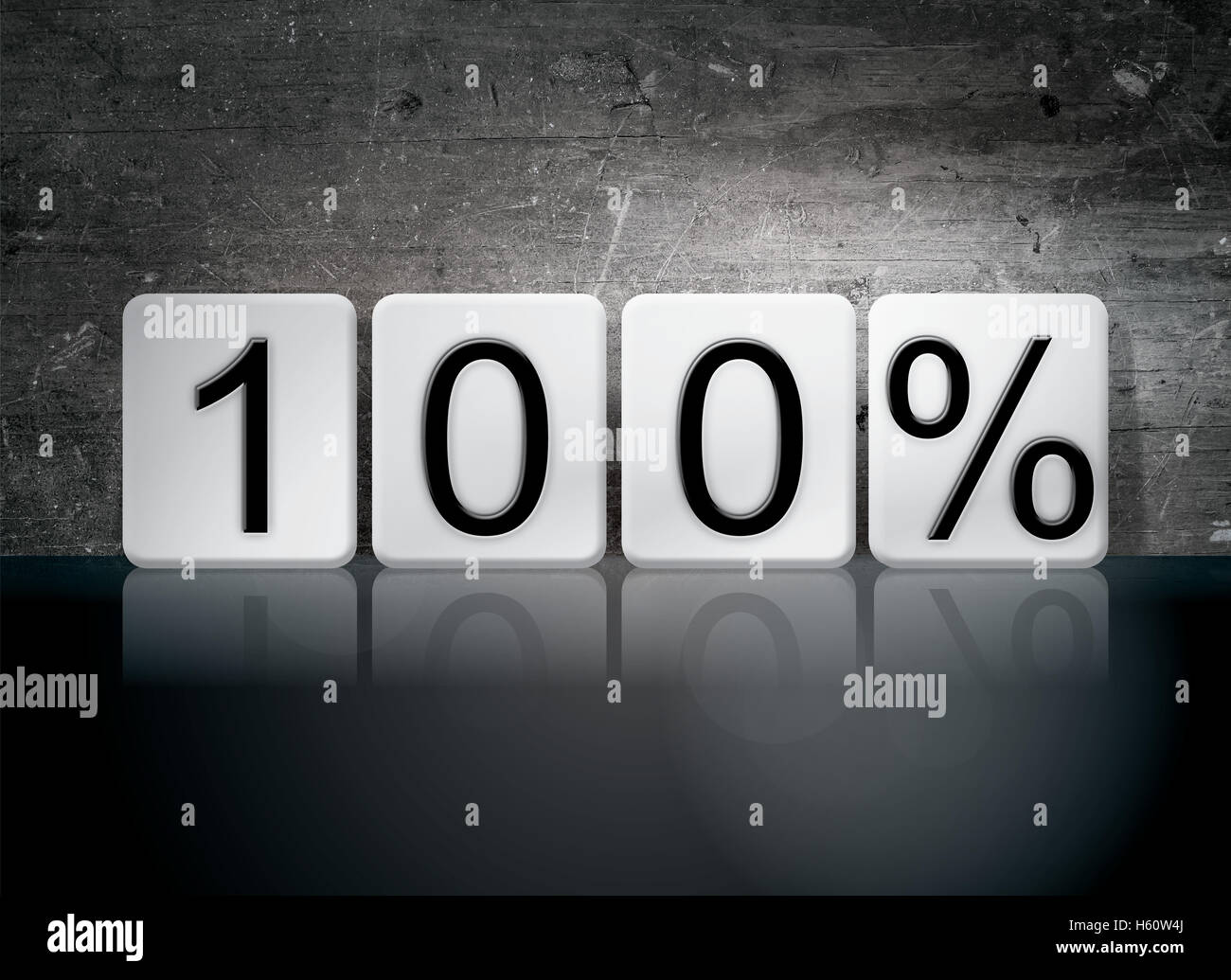 The word "100 Percent" written in white tiles against a dark vintage ...