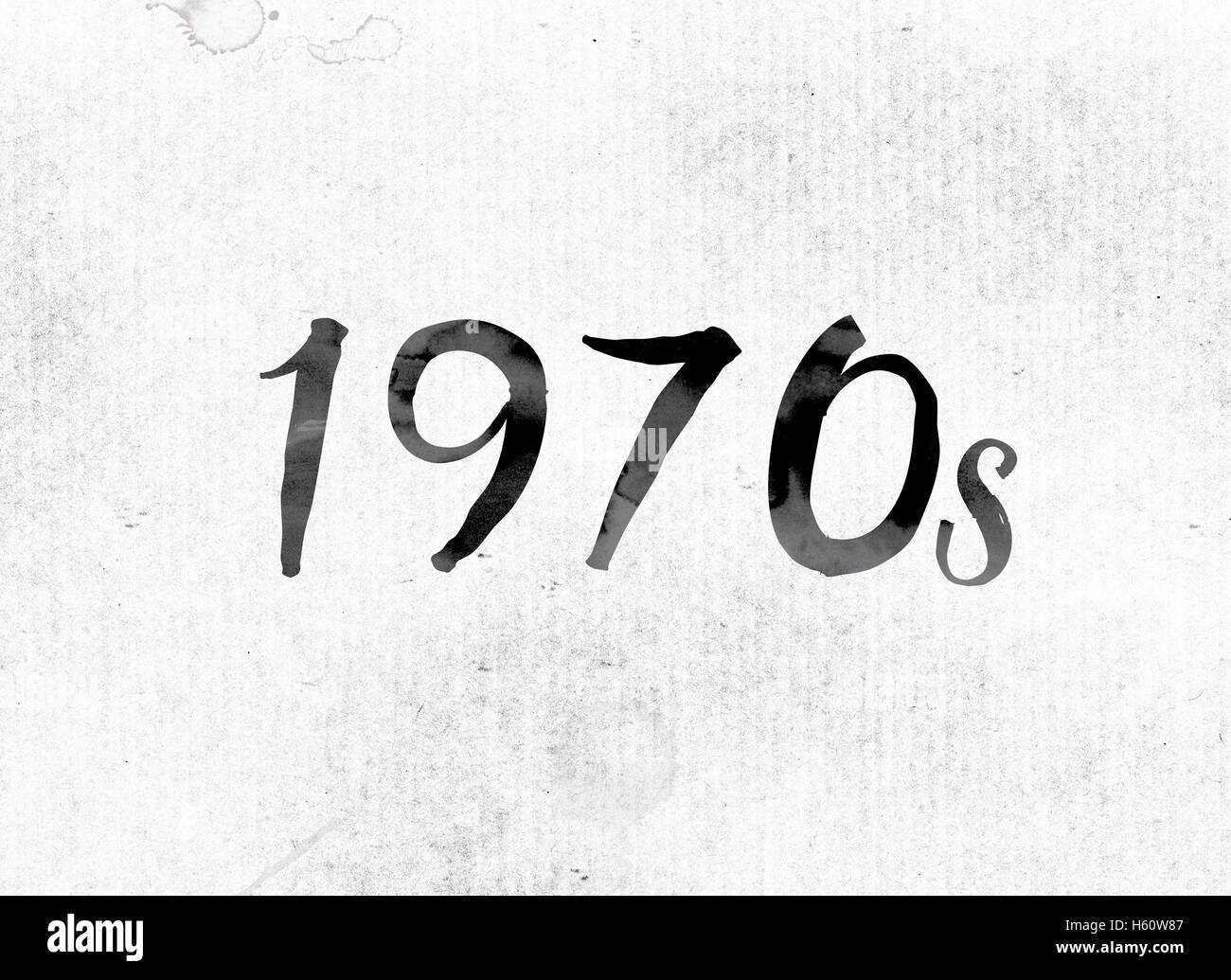 The word "1970s" concept and theme painted in watercolor ink on a white ...