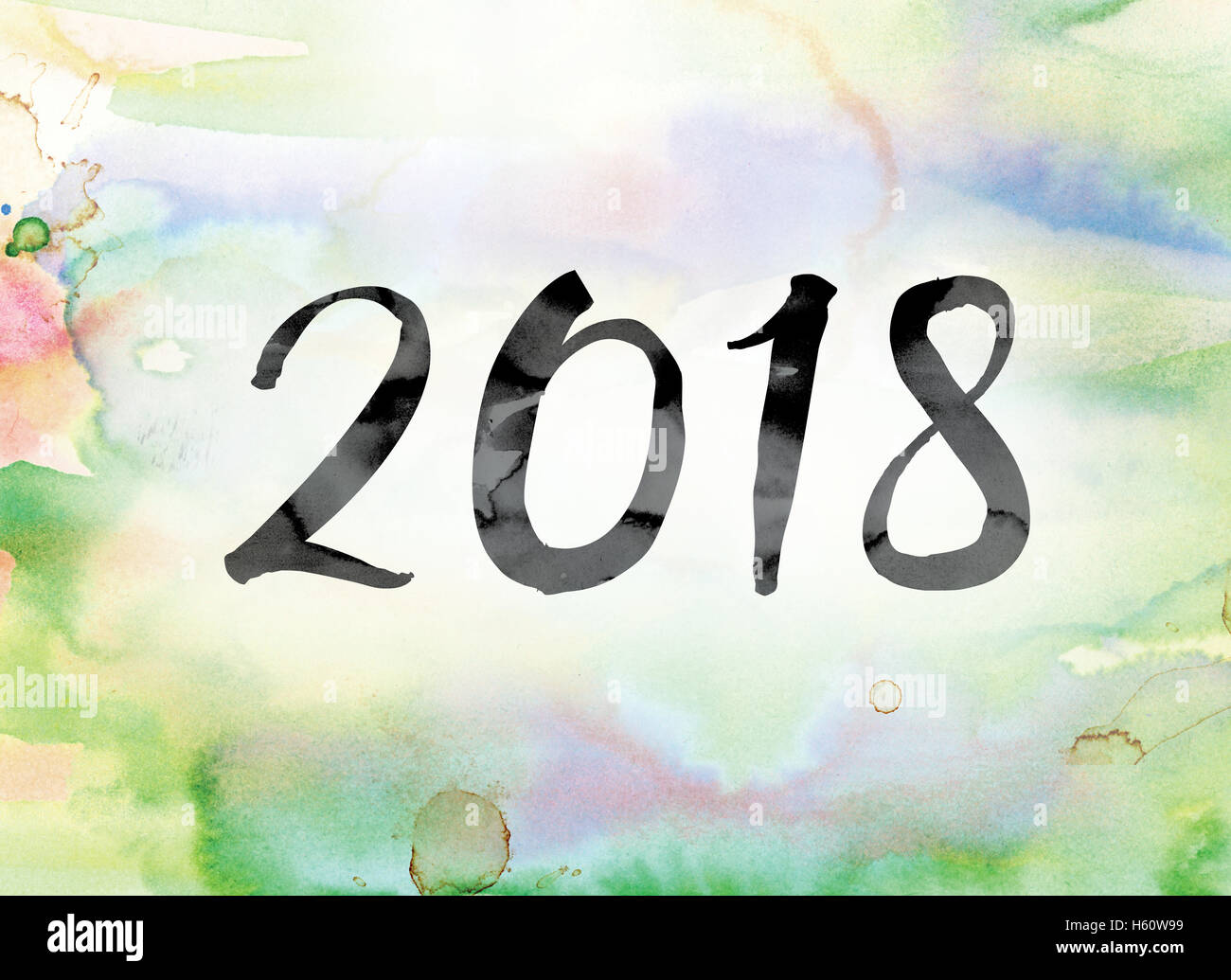 The word "2018" painted in black ink over a colorful watercolor washed ...