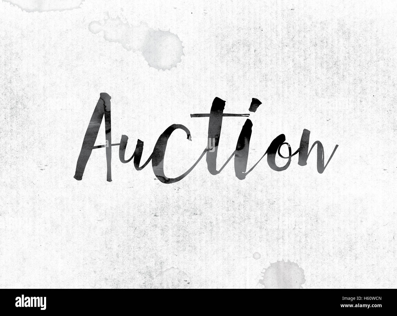 The word "Auction" concept and theme painted in watercolor ink on a ...