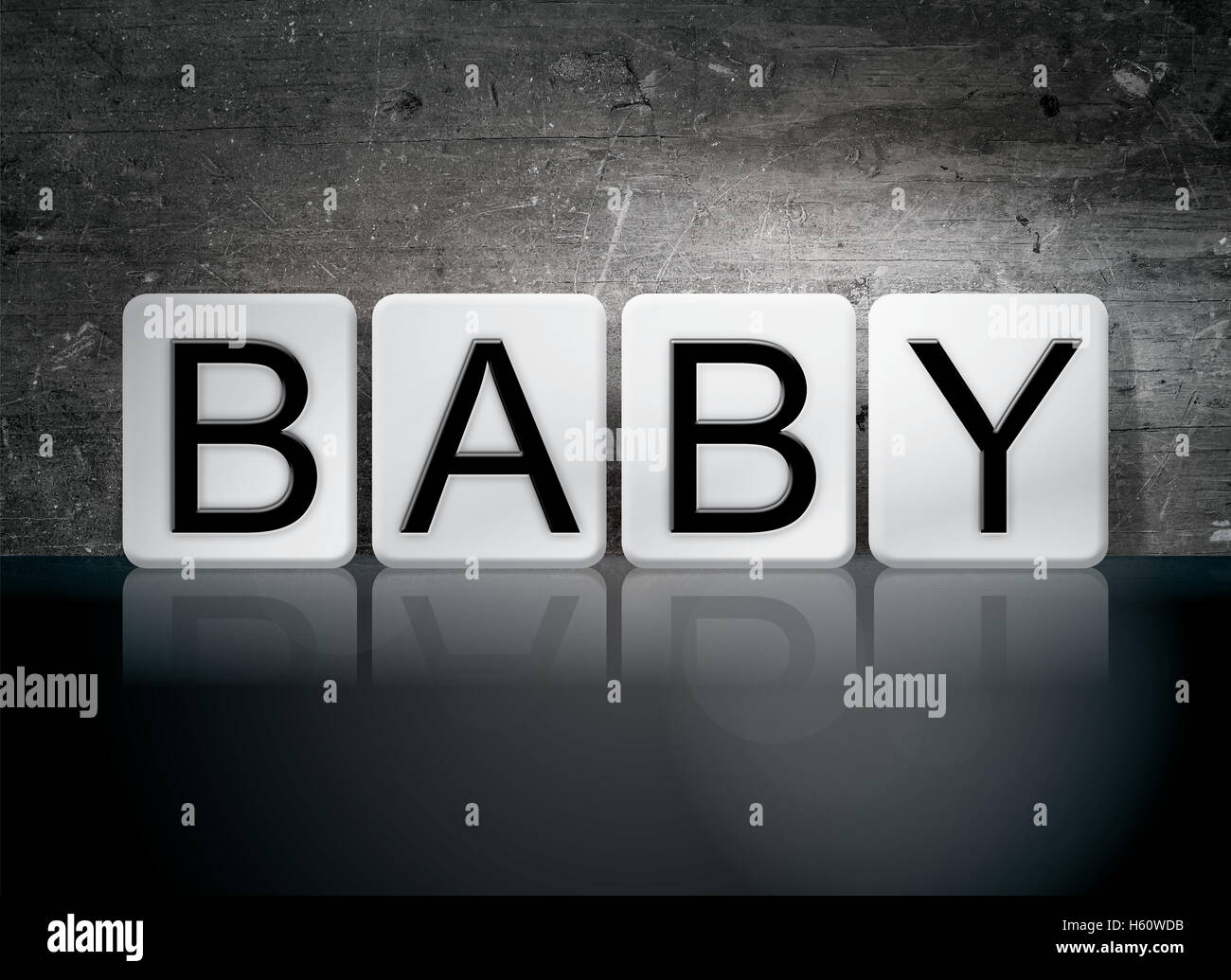 The word "Baby" written in white tiles against a dark vintage grunge ...
