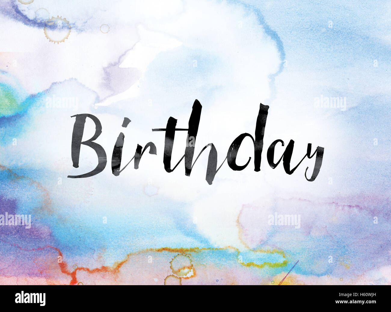 The word "Birthday" painted in black ink over a colorful watercolor ...