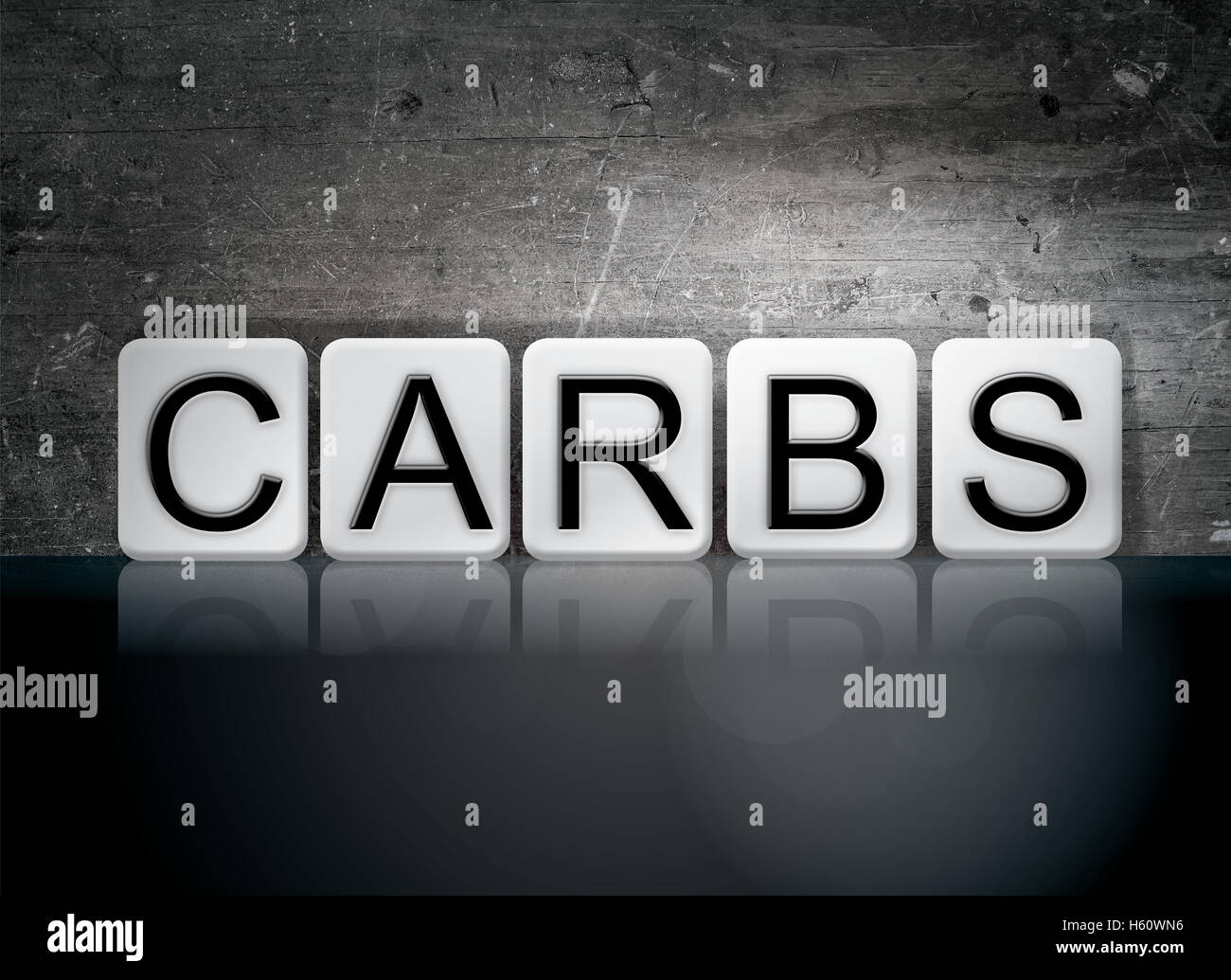The word "Carbs" written in white tiles against a dark vintage grunge ...
