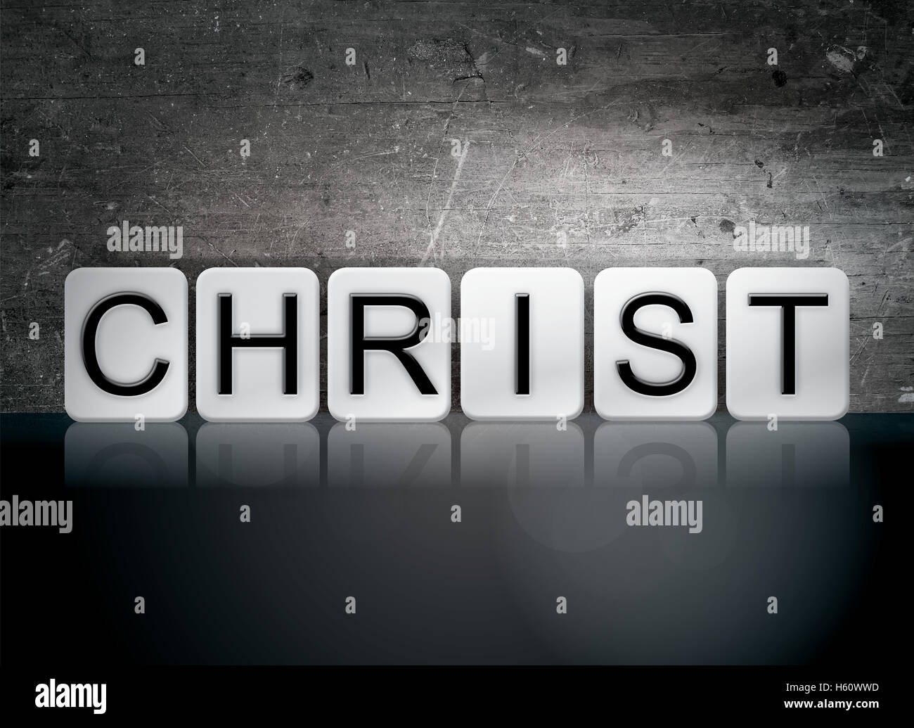 The word "Christ" written in white tiles against a dark vintage grunge ...