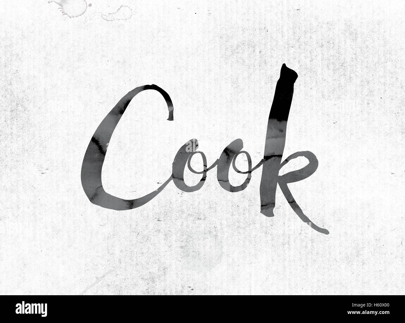 The word "Cook" concept and theme painted in watercolor ink on a white ...
