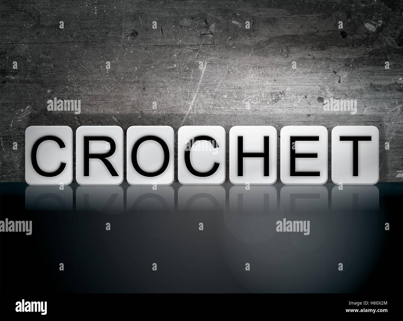 The word "Crochet" written in white tiles against a dark vintage grunge ...