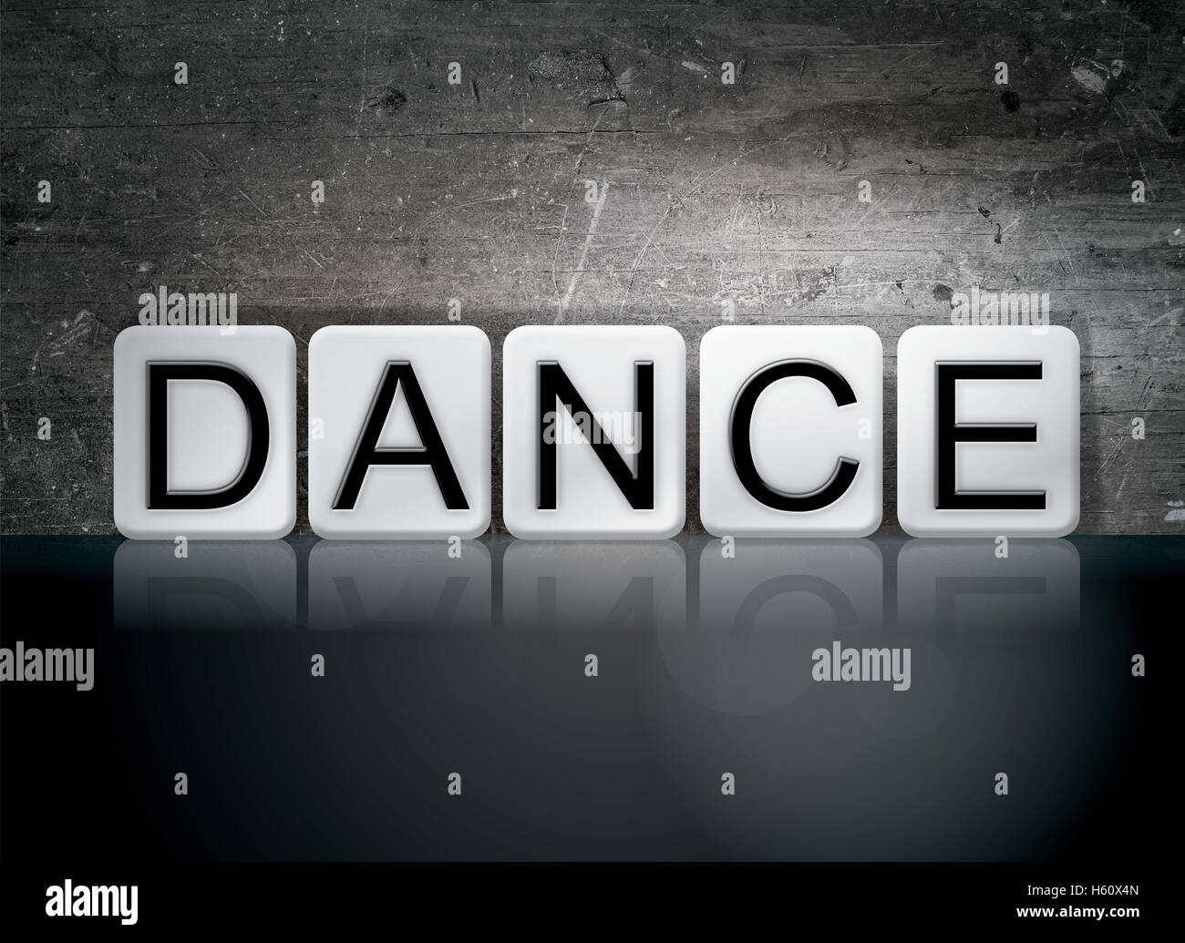 The word "Dance" written in white tiles against a dark vintage grunge ...