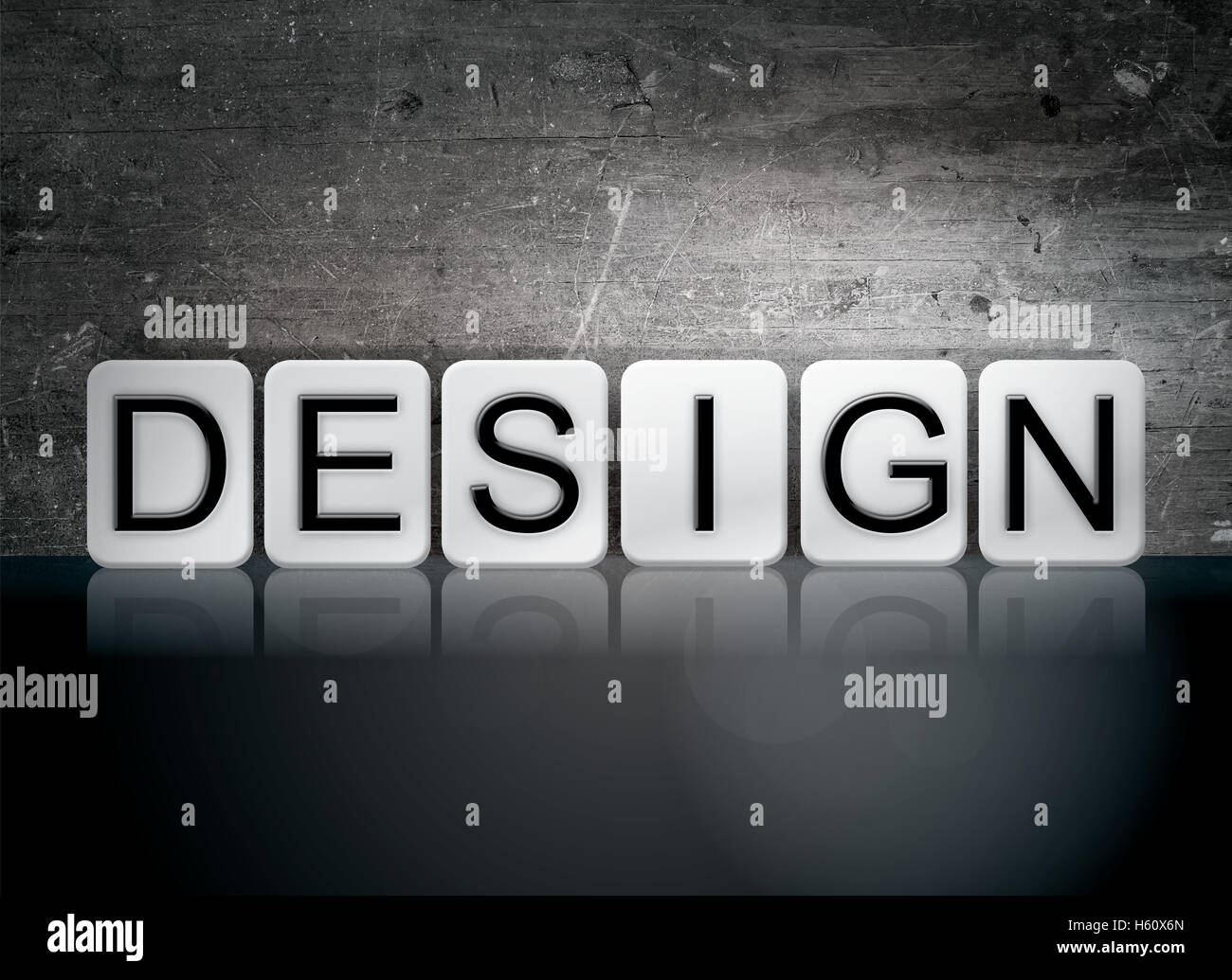 The word "Design" written in white tiles against a dark vintage grunge ...