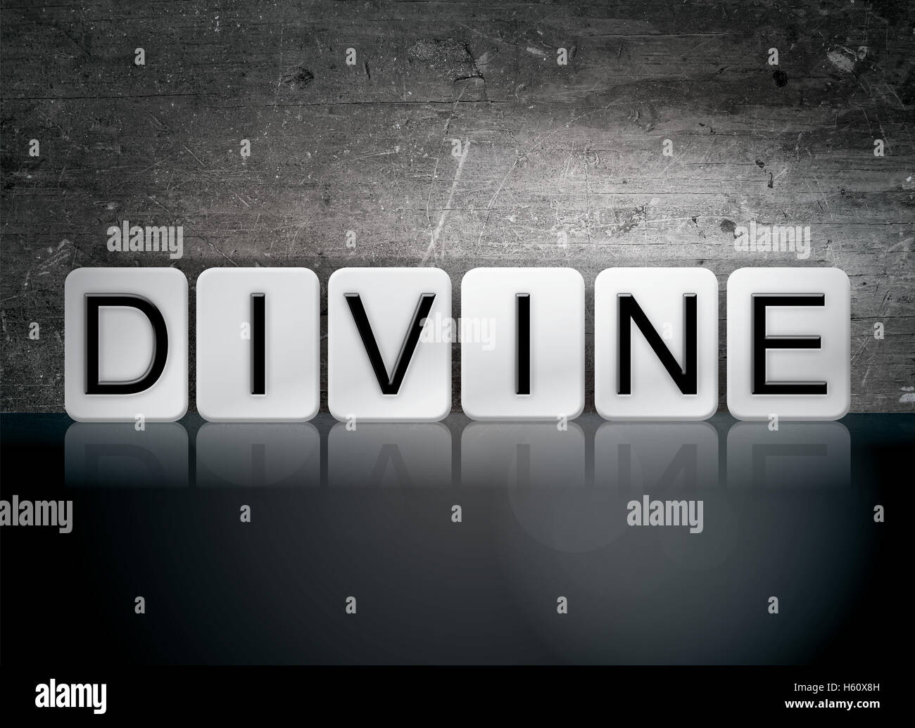 The word "Divine" written in white tiles against a dark vintage grunge ...
