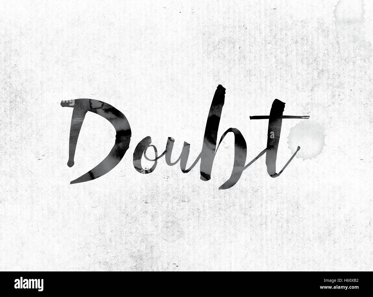 The word "Doubt" concept and theme painted in watercolor ink on a white ...