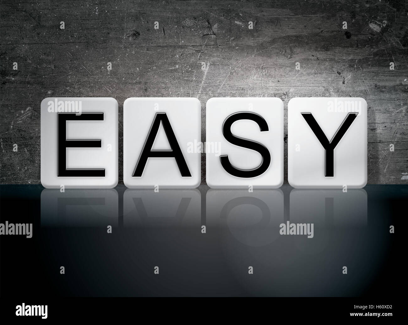 The word "Easy" written in white tiles against a dark vintage grunge ...