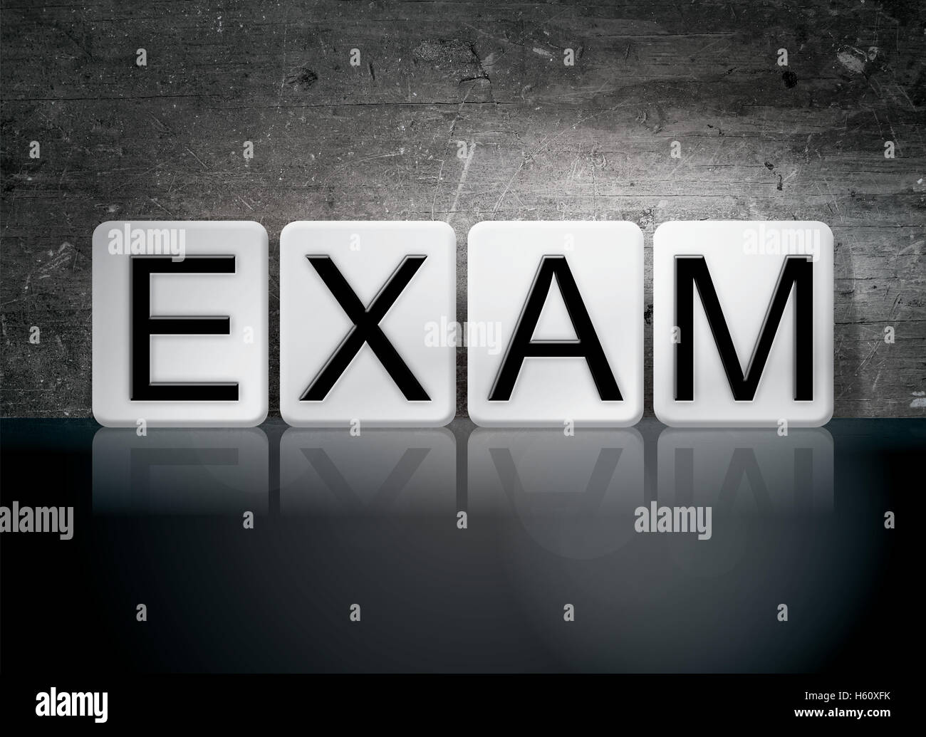 The word "Exam" written in white tiles against a dark vintage grunge ...