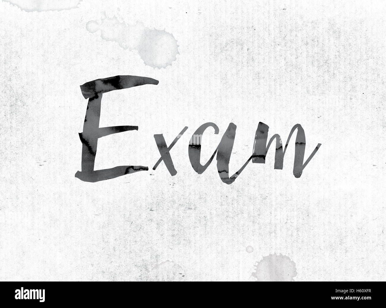The word "Exam" concept and theme painted in watercolor ink on a white ...