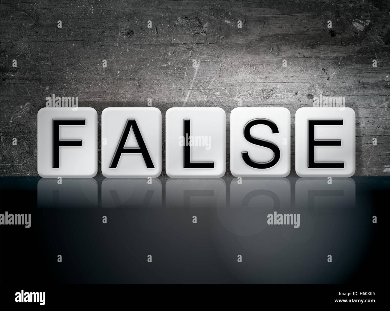 The word "False" written in white tiles against a dark vintage grunge ...