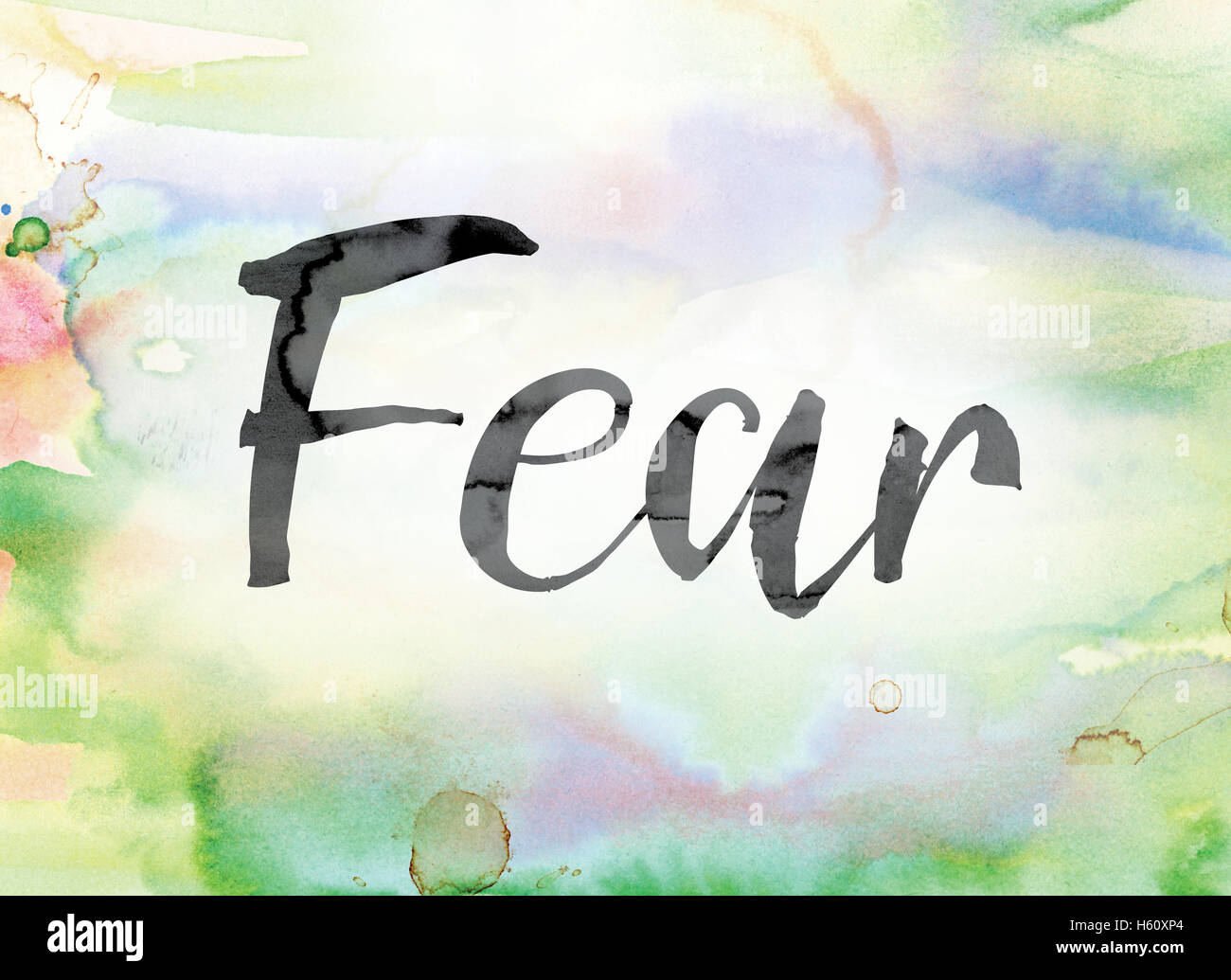 The word "Fear" painted in black ink over a colorful watercolor washed ...