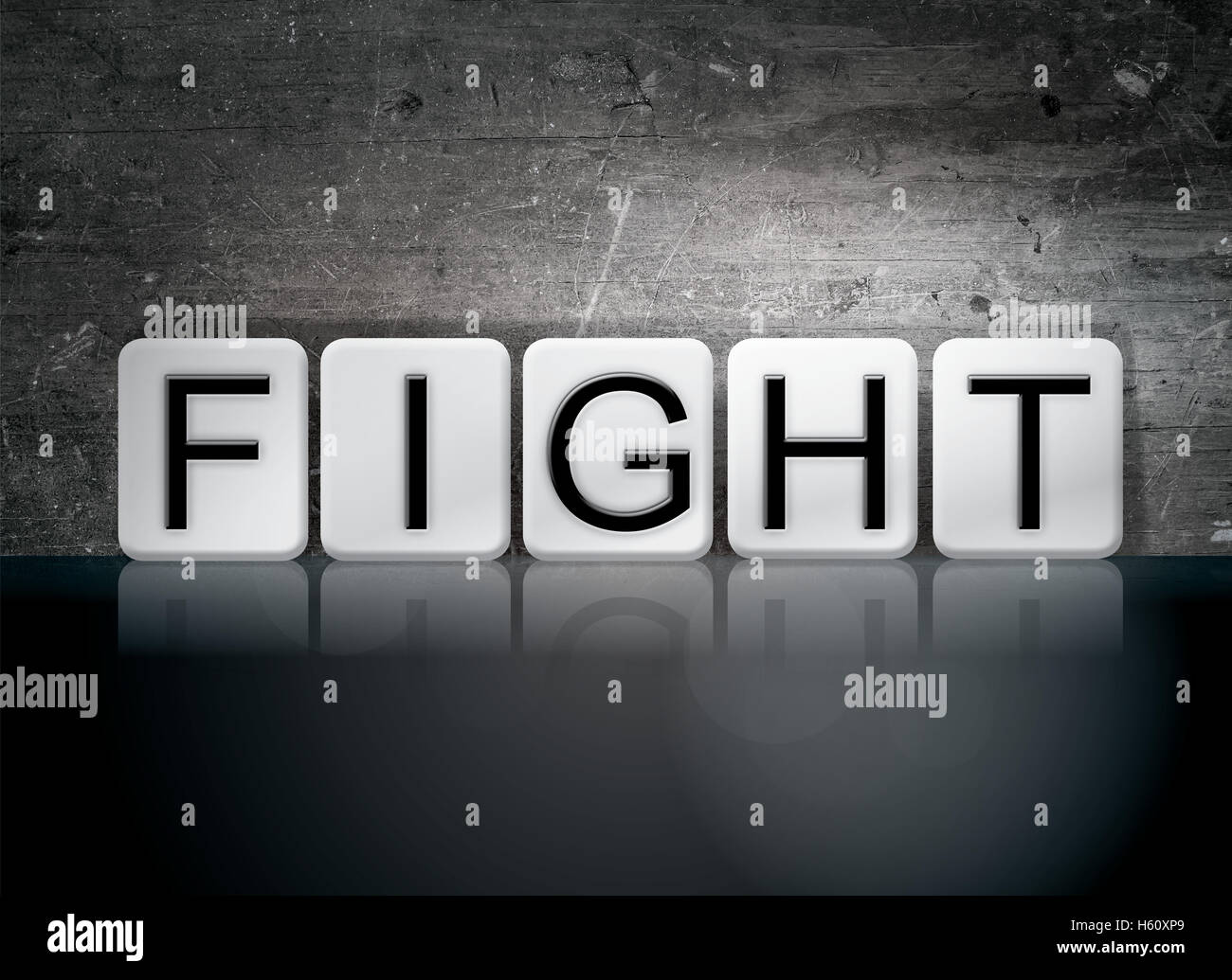 The word "Fight" written in white tiles against a dark vintage grunge ...