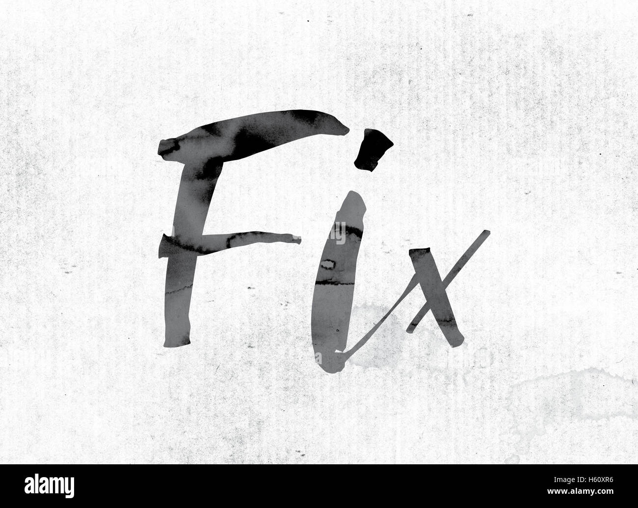 The word "Fix" concept and theme painted in watercolor ink on a white ...
