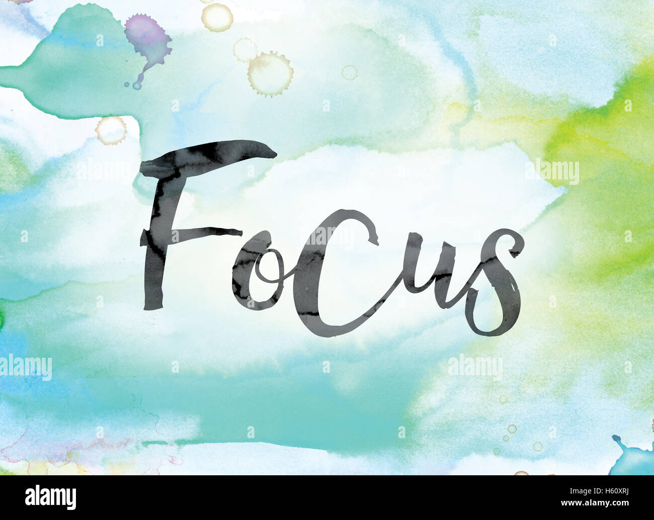 The word "Focus" painted in black ink over a colorful watercolor washed ...