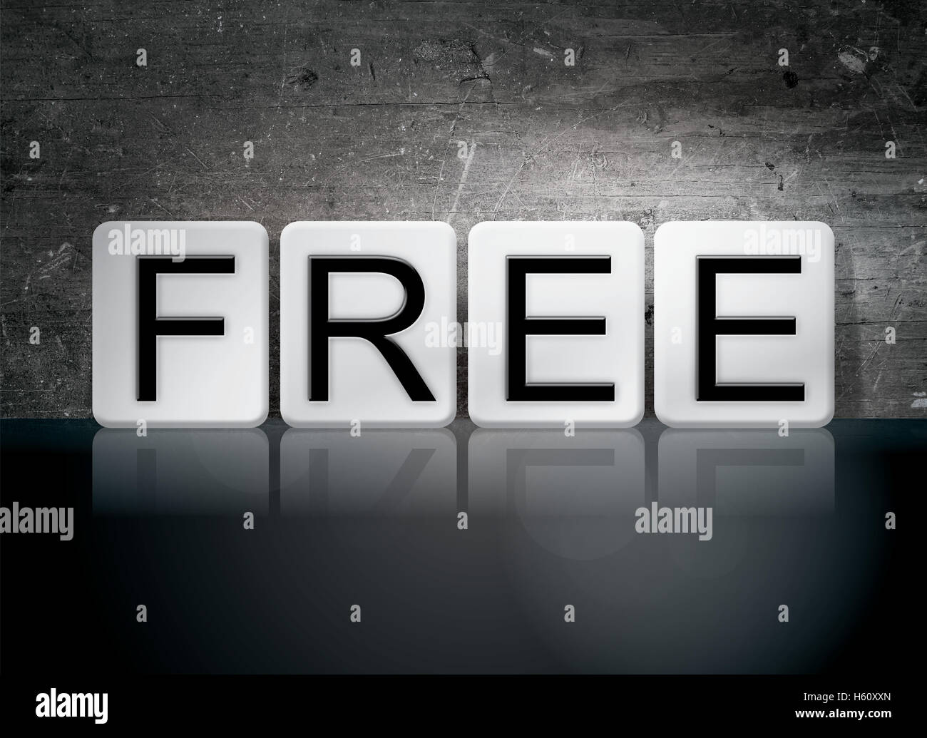 The word "Free" written in white tiles against a dark vintage grunge ...